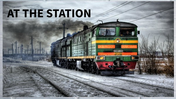AT THE STATION | Genially